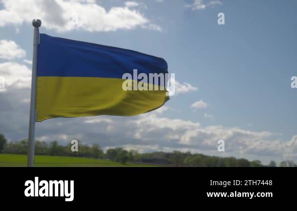 Ukraine flag waving background sky blue and yellow national color ...