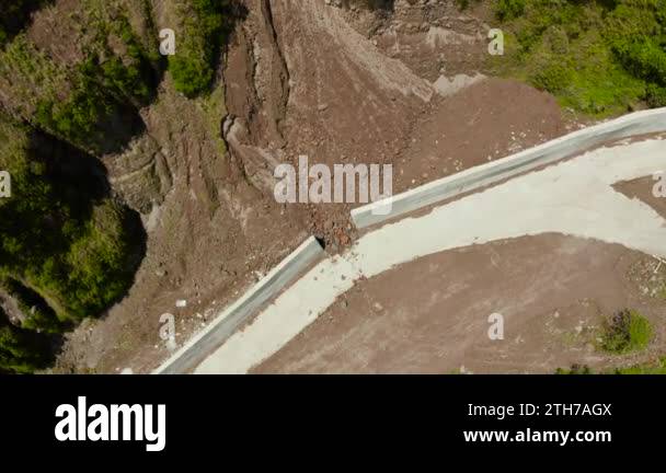 Mountain landslide and rock falls in an environmentally hazardous area ...