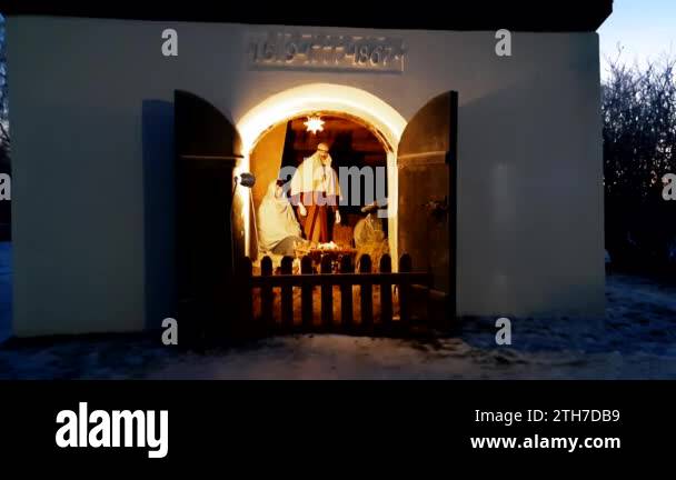 The birth of Jesus Christ illustrated, storytelling scene with crib in ...