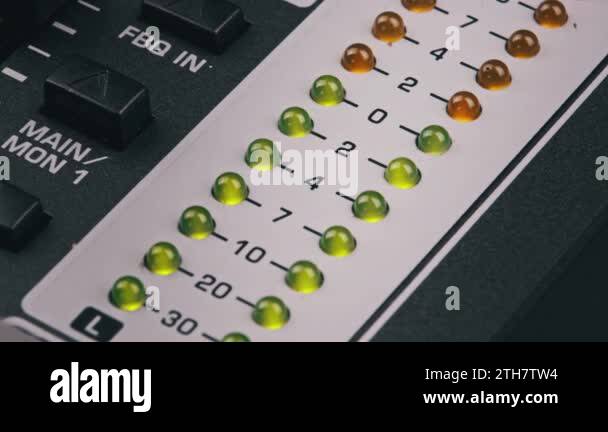LED indicator of sound level signal on the mixing console. LED strip in ...