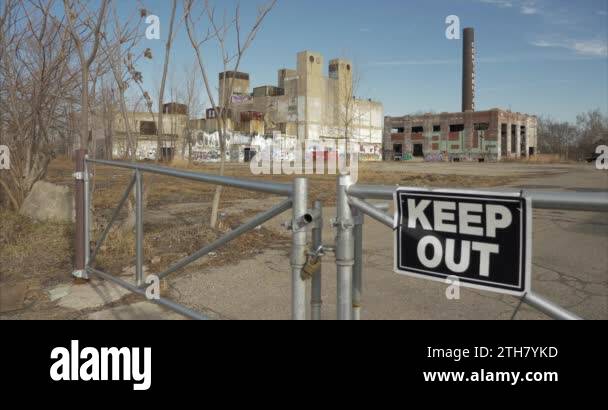 View of an established shot of abandoned manufacture building in ...