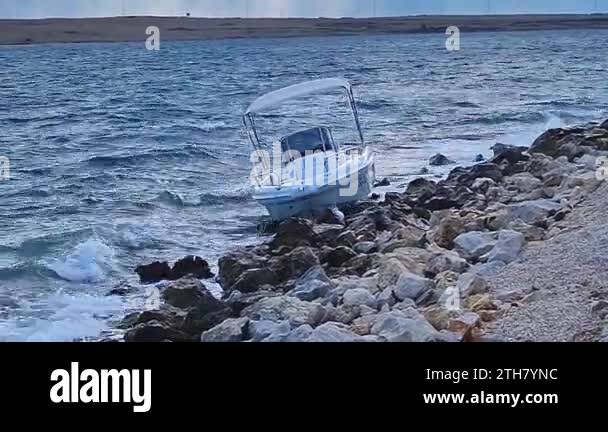Boat crashes on rocks Stock Videos & Footage - HD and 4K Video Clips ...