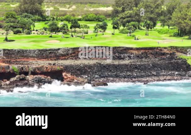 Landscape view of modern golf resort hotel on green tropical island on ...