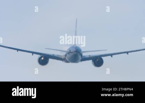 Widebody aircraft take off. Jet plane fly away, rear view. Departing ...