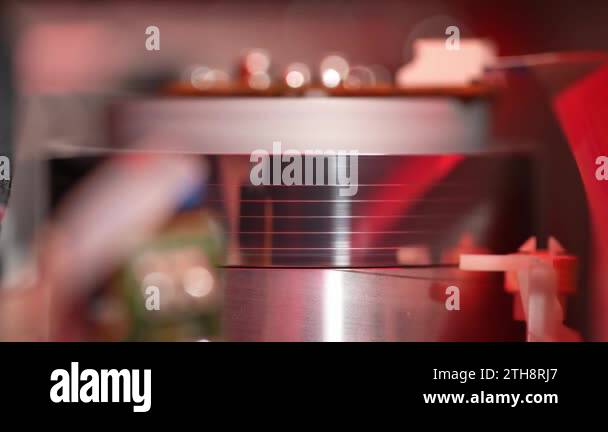 VCR VHS mechanics, video cassette player close-up insert magnetic tape ...