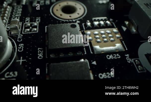 Macro dolly shot side view of a computer electrical circuit with cip ...