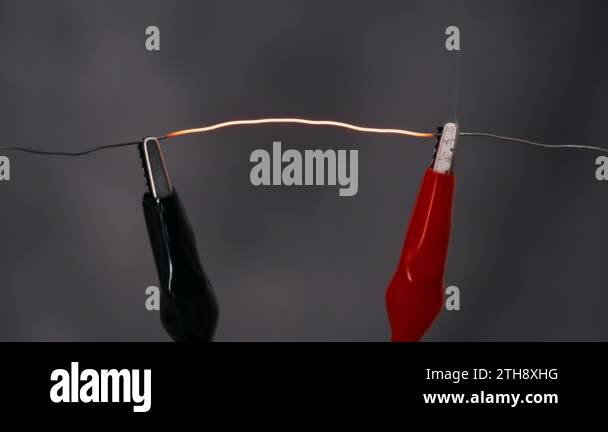 Nichrome wire heated to red under high current strength. Nichrome ...