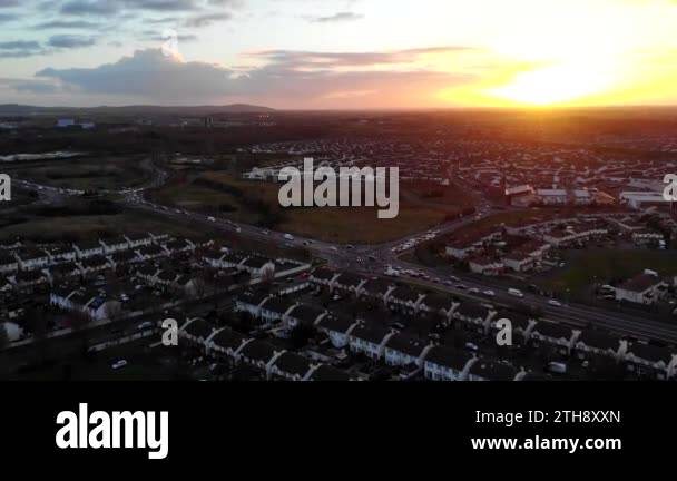 Aerial - A residential of Lucan, a magic hour cold day with a sunset ...