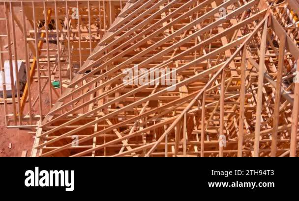 A new build with wooden trusses and frame beam framework, including ...