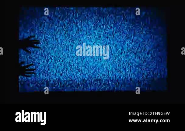 Hands on the background of the noise of the TV scary scene for a horror ...