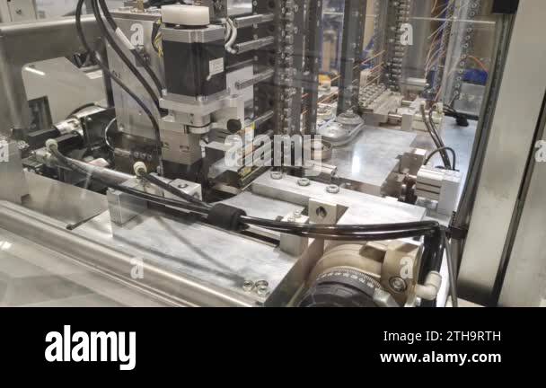 wire cutting machine. Automated automotive production. robotic process ...