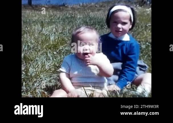 rome ,italy june 01 1960:small children play in the 1960s countryside ...