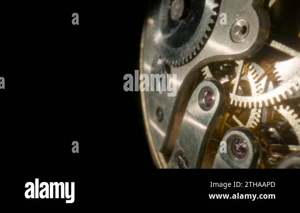 Macro shot of gold internal parts of antique pocket watch. Clockwork ...