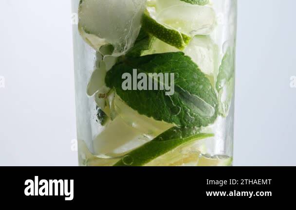 Cold lemonade mojito cocktail carbonated drink. Closeup refreshing soda tonic fizzy sparkling ...