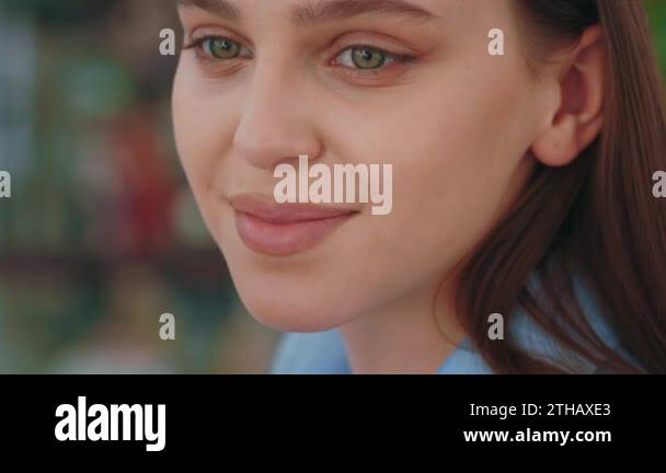 Close up Girl Face with Beautiful Smiling Looking around with Green ...