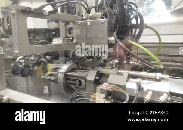 wire cutting machine. Automated automotive production. robotic process ...