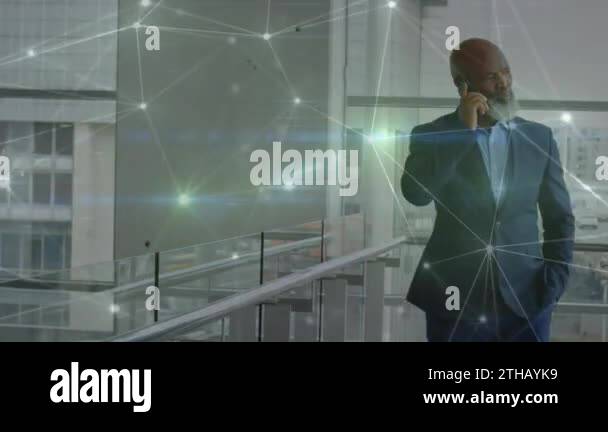 Animation of globe and connections over african american businessman using smartphone. global ...