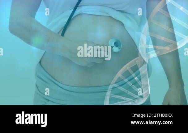 Animation of dna strand and molecules over pregnant woman with ...