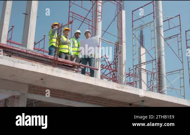 Team group of contractor and architect with foreman explaining about ...