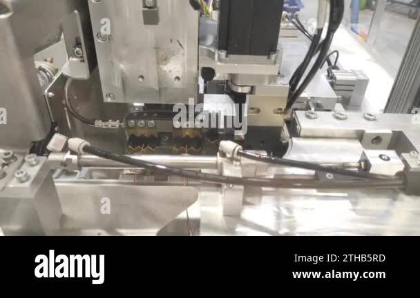 wire cutting machine. Automated automotive production. robotic process ...