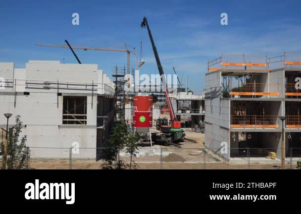 Day in the life of a crane on a construction site time lapse moving ...