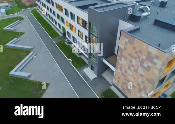 School building with decorated facade in residential district of large ...