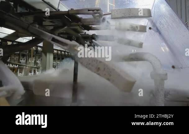 Freezing ice cream at the factory. Automatic production of ice cream ...