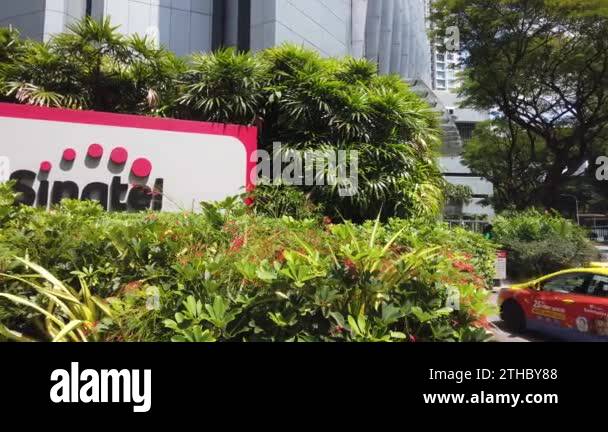 Singapore 2 June 2022 street view of SingTel company logo Stock Video ...