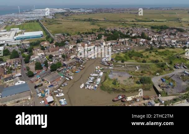 Wide aerial pullback revealing Queenborough and Sheerness town & Docks ...