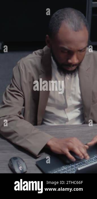 Vertical video: Police officer reading statements and records to catch ...