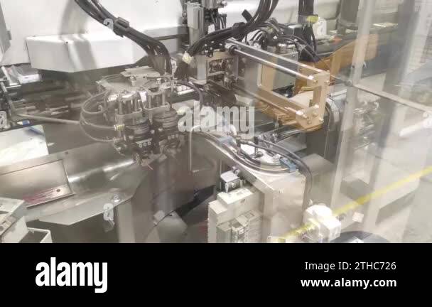 wire cutting machine. Automated automotive production. robotic process ...