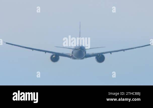 Widebody aircraft take off. Jet plane in the sky, rear view. Flight ...