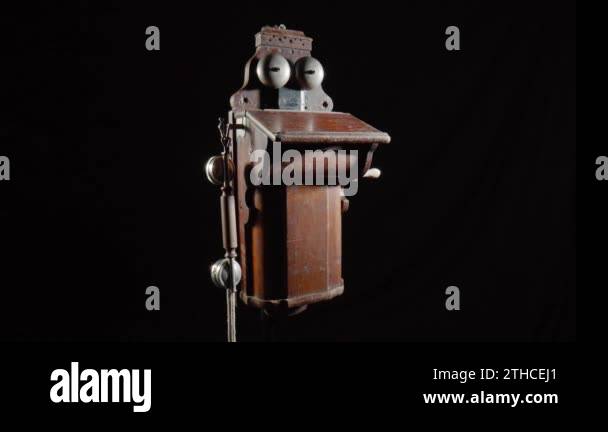 Wooden brown antique telephone apparatus with two metal hemispheres for ...