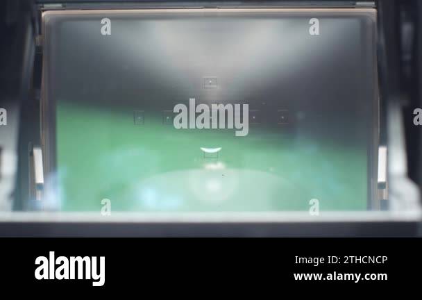 Actuation of the shutter mechanism of an old film camera inside the ...