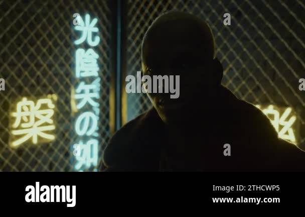 Shoulder-up portrait of Black guy with white hair in faux fur coat ...