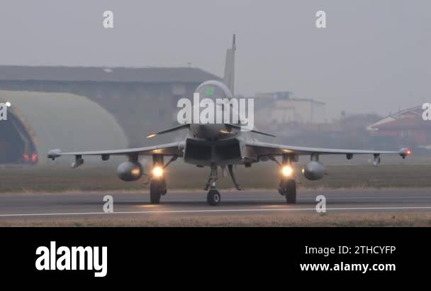 NATO Fighter Jet on Runway Frontal View with Landing Light On. Turn ...