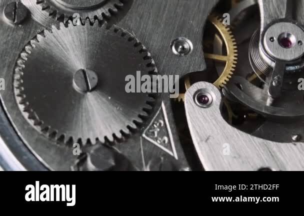 Clock mechanism rotates close-up. The working mechanism of round ...