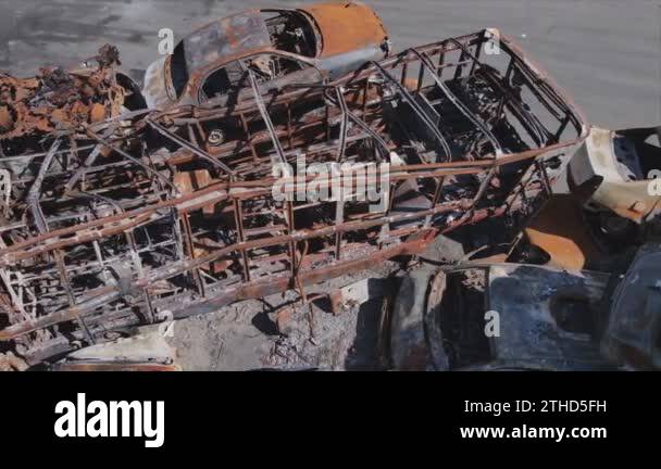 This stock video shows a dump of shot and burned cars in Irpin, Bucha ...