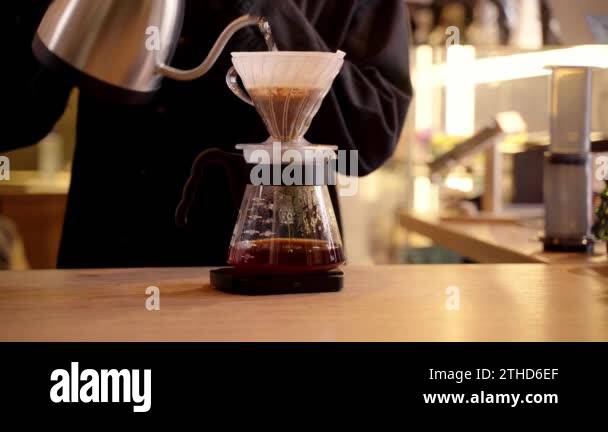 4k video Pour over filter coffee alternative brewing method. Pouring ...