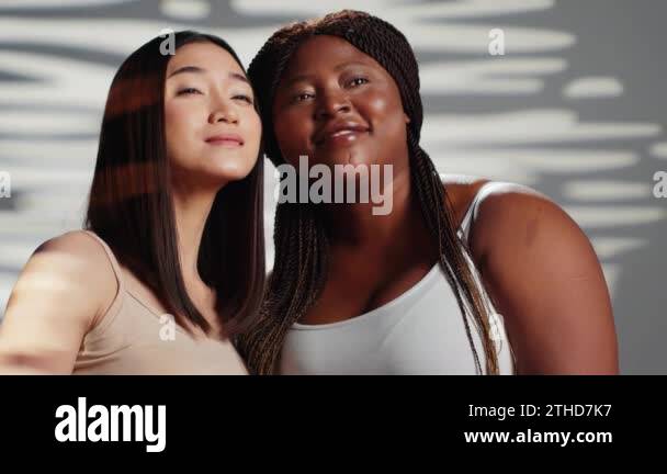 Models doing skincare wellness campaign in studio, diverse women posing ...