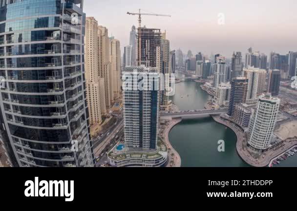 Panoramic aerial top view day to night transition timelapse of all ...