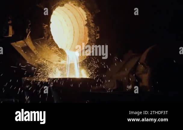 Liquid Iron Molten Metal Pouring from Ladle Container into Mold ...