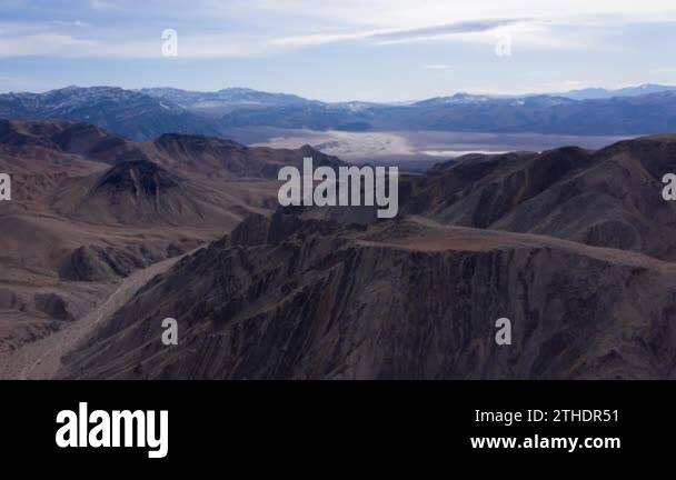 An aerial hyper-lapse of the Last Chance Mountain Range. The Eureka ...