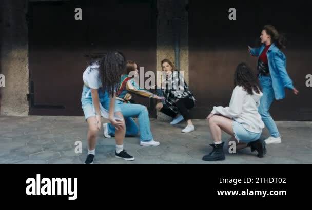 Street style performers dancing showing hip hop freestyle movements ...