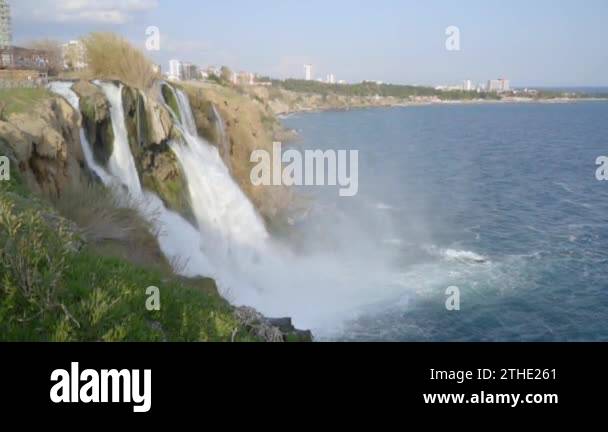 A powerful stream of waterfall with a transition to the frame in the ...