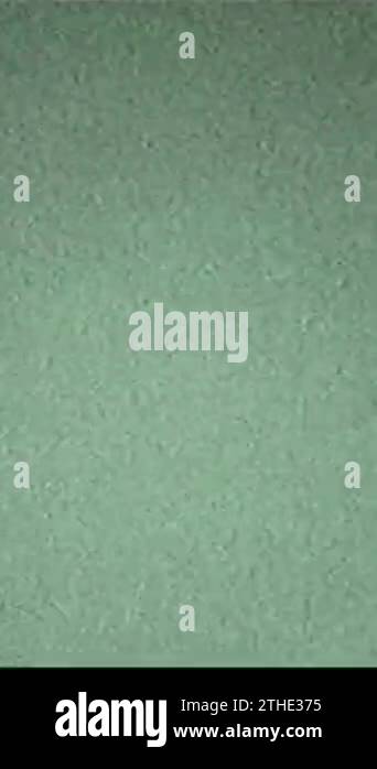 Vertical video. Retro film glitch noise. Old TV interference. Real ...