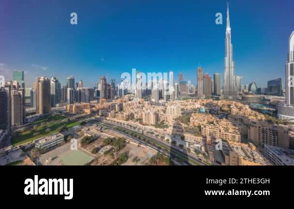 Dubai Downtown morning timelapse with sun reflected from tallest ...