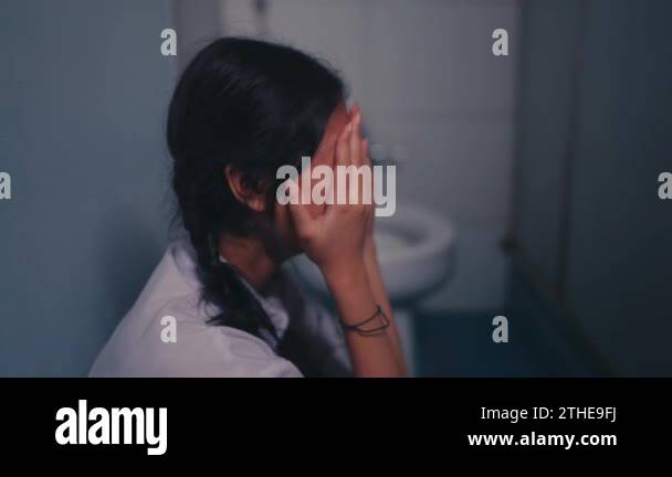 a high school teenager crying and down was lamenting his fate after ...