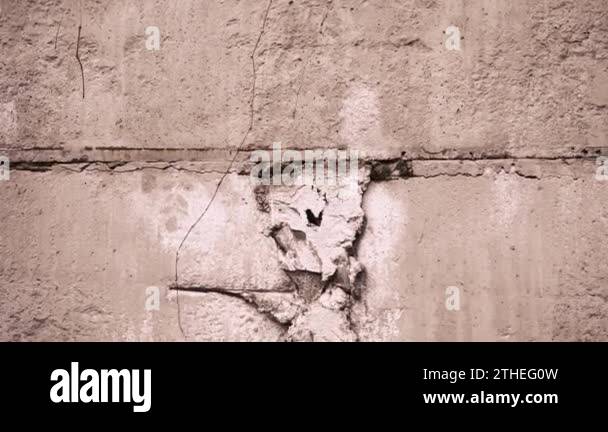 Crack in the wall of an old house. Cracks in the fa ade or exterior ...