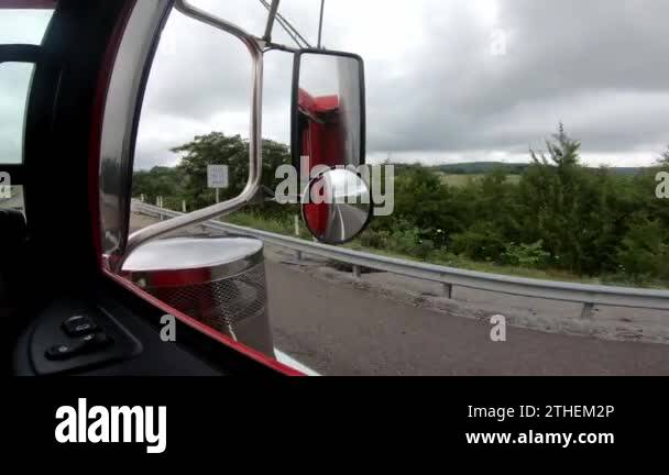 Cutaway shot out semi truck window along the highway Stock Video ...